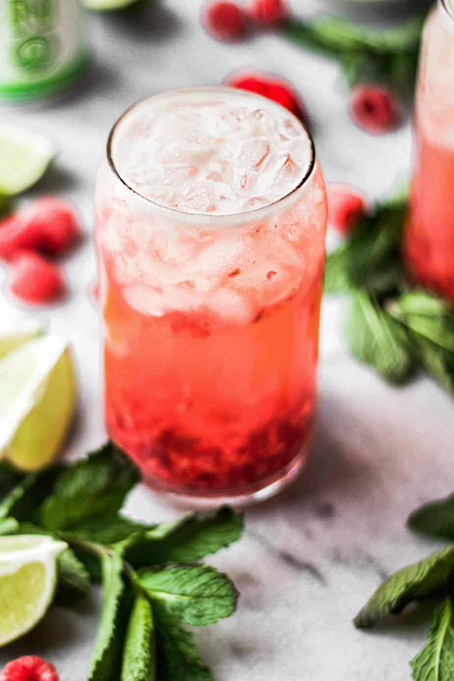 raspberry gin rickey cocktail with hard seltzer